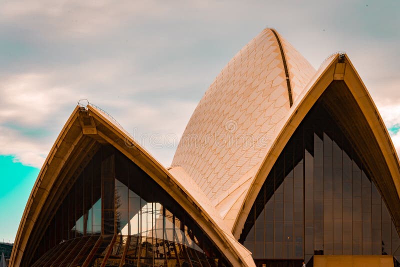 Facade of the Famous Sydney Harbour Opera House Against a Cloudy Sky ...