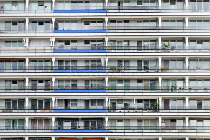 The Facade of a High Building with Some Balcony Stock Photo - Image of ...