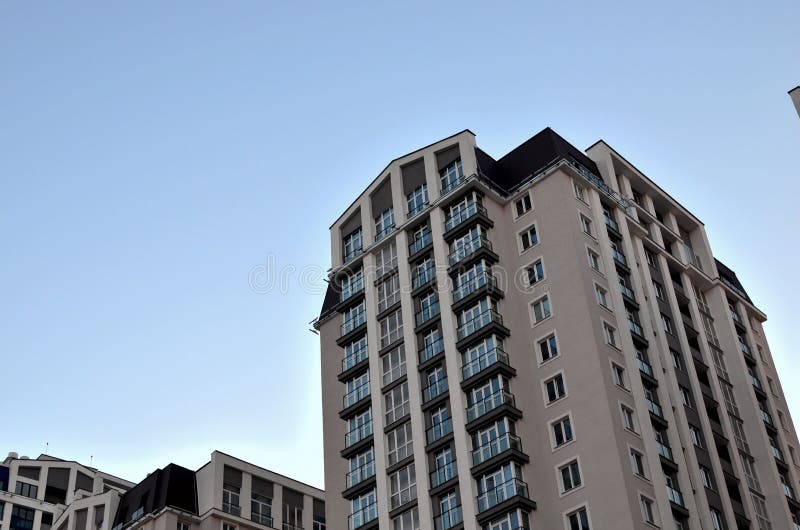 The Facade of a High-rise Building with Windows and Balconies. Stock ...