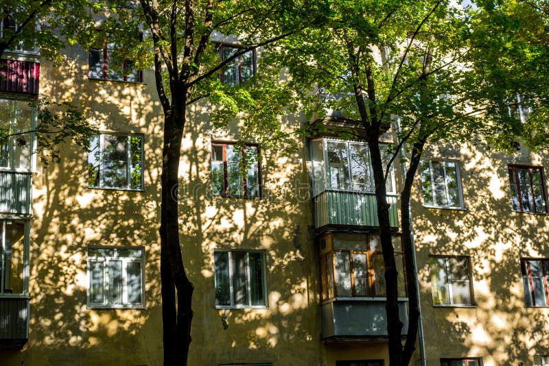 The Facade of a House with Windows and Balconies Stock Photo - Image of ...