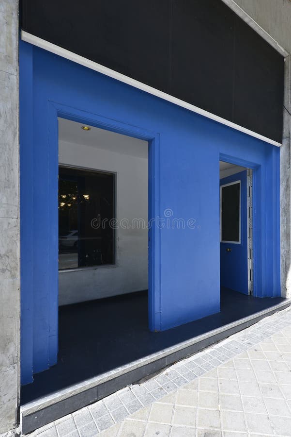 Facade of a Local with Walls Painted in Blue Stock Photo - Image of ...