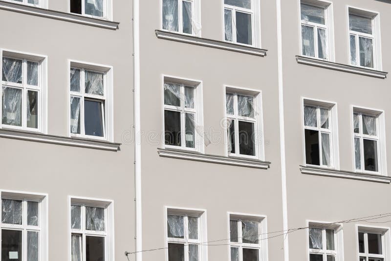 Facade with many windows stock image. Image of window - 131218747