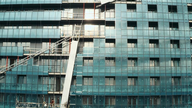 Facade of Moderm Multi-storey Glass Building Under Construction with ...