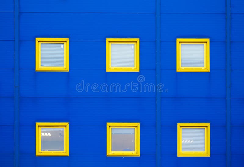 Facade of a Modern Blue Warehouse and Six Yellow Windows Stock Image ...