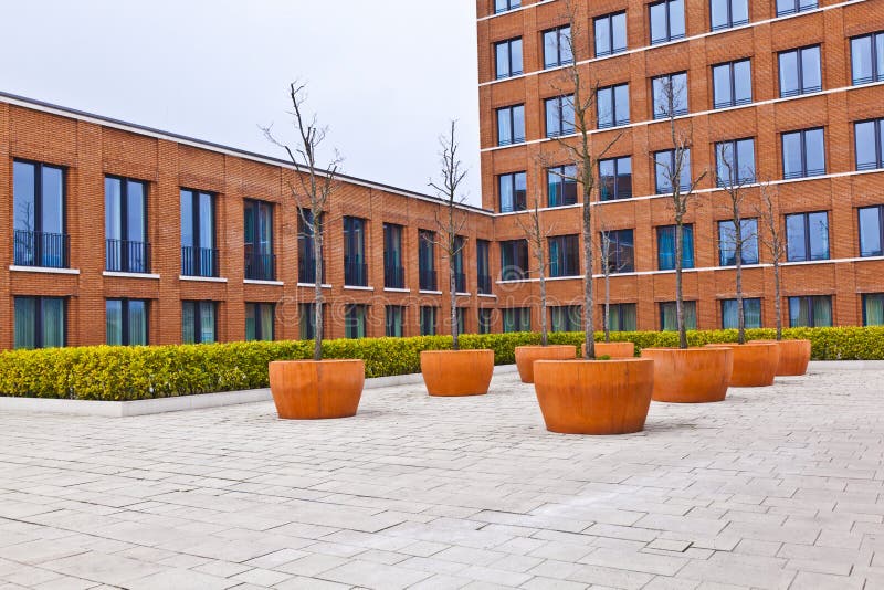 Facade of Modern Brick Building with a Tree in Front Editorial Image ...