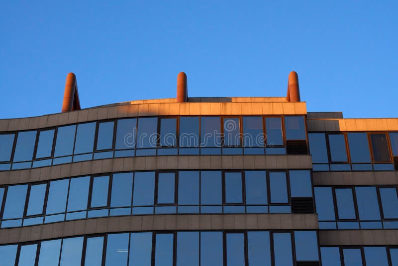 Facade of a Modern Building with a Blue Sky Background Stock Photo ...