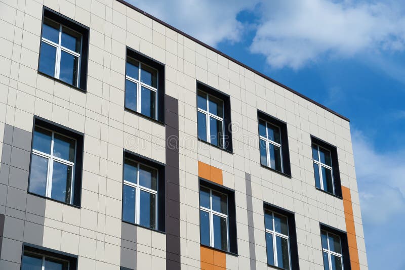 Facade of a Modern Building on a Bright Sunny Day, Siding and Windows ...