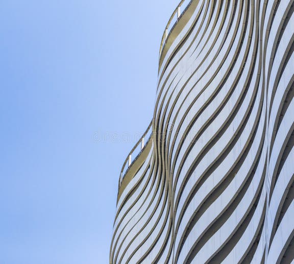 Facade of the Modern Building Made in Shape of the Waves. Urban Stock ...