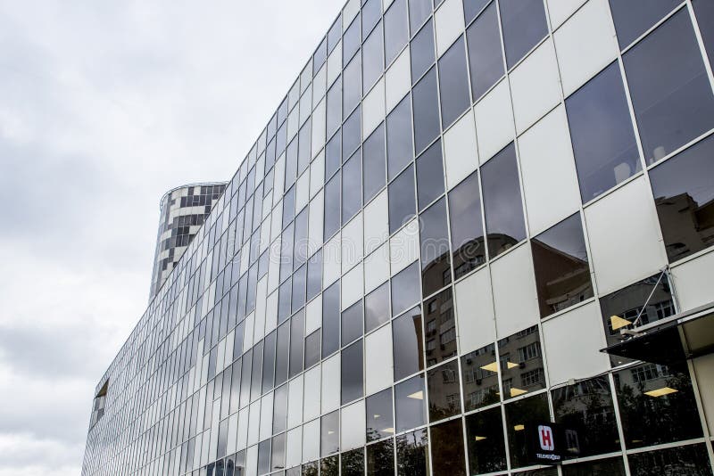 The Facade of a Modern Multi-storey High-rise Building with Windows in ...