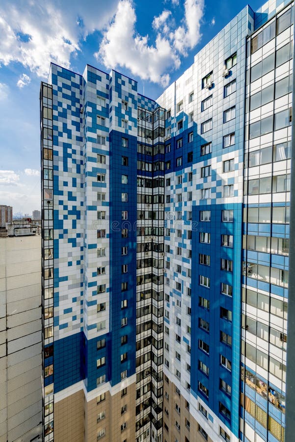The Facade of a Modern Multi-storey High-rise Building with Windows in ...