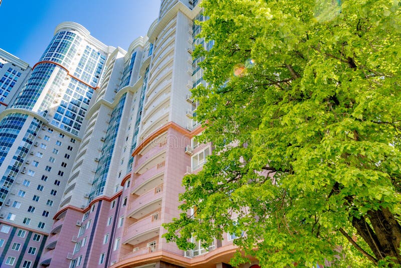 The Facade of a Modern Multi-storey High-rise Building with Windows in ...