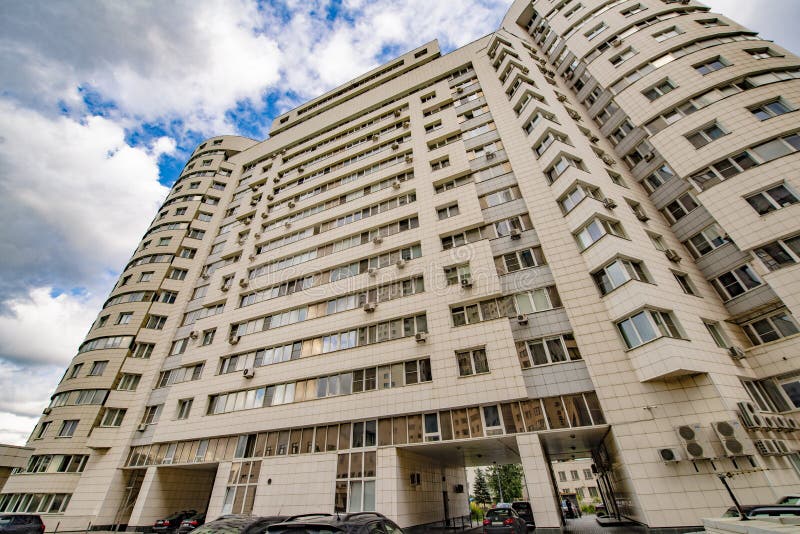 The Facade of a Modern Multi-storey High-rise Building with Windows in ...