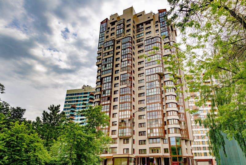 The Facade of a Modern Multi-storey High-rise Building with Windows in ...