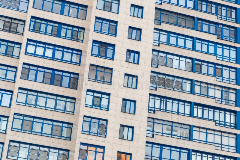 Facade of a Modern Office Building with Many Windows Close Up Stock ...