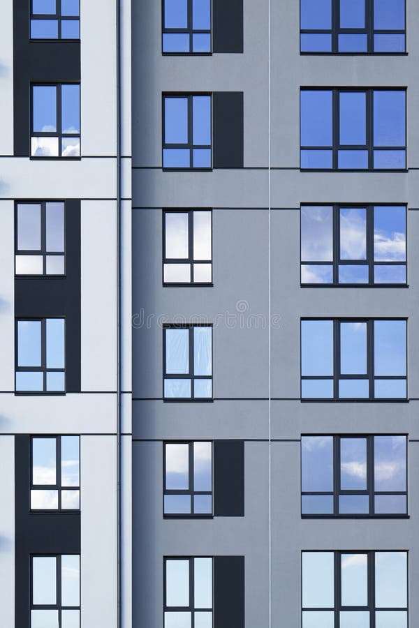 Facade of Modern Residential Apartment Building with Reflection of ...