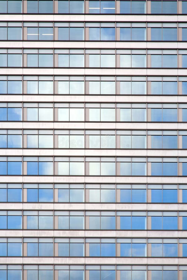 Facade of Office Building with Overcast Sky Reflected Stock Photo ...