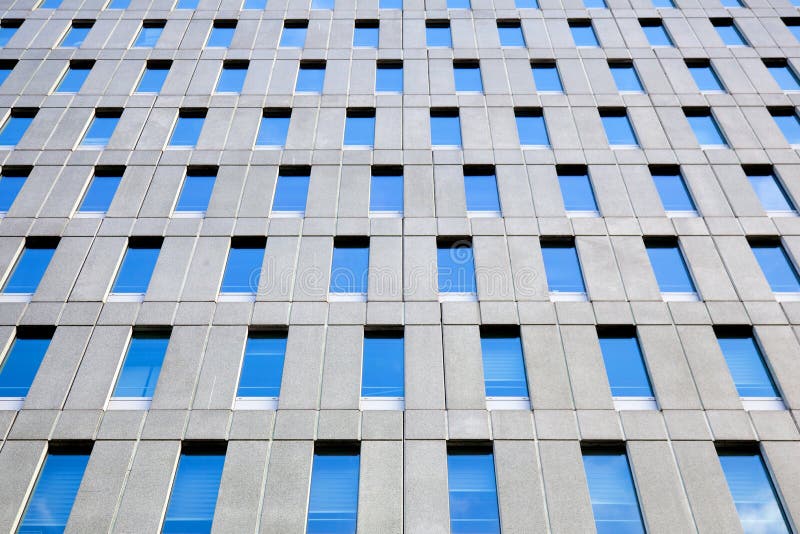 Facade of Office Building with Overcast Sky Reflected Stock Image ...