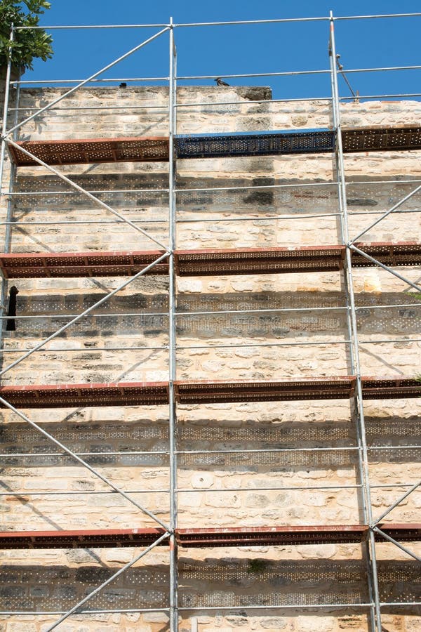 Facade of an Old Brick Wall with Scaffolding or H-frame Structure Stock ...