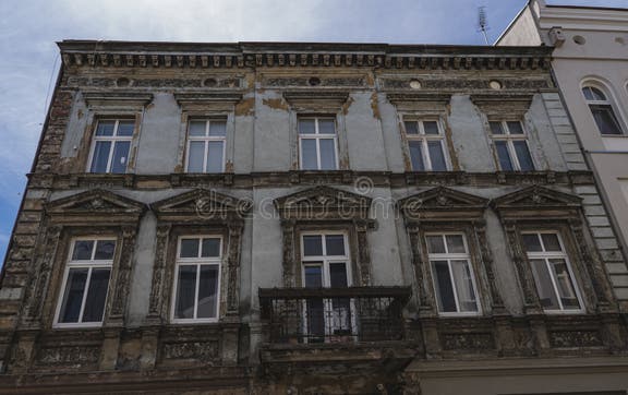 Facade of Old and Damaged Building with Falling Off Plaster Stock Photo ...