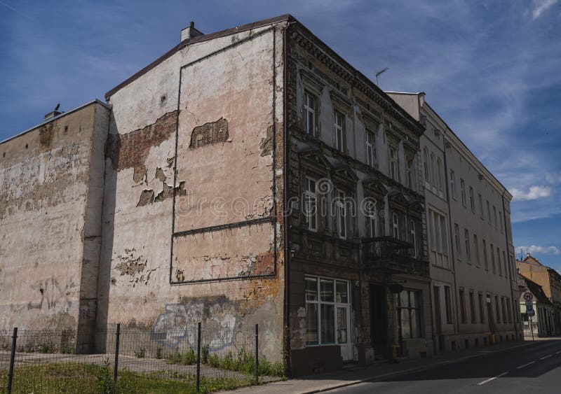 Facade of Old and Damaged Building with Falling Off Plaster Stock Image ...