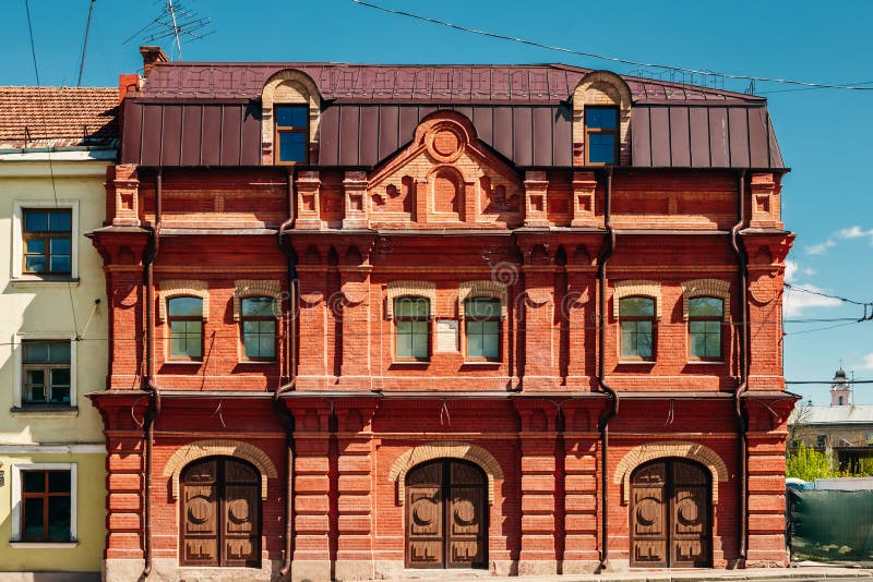 Facade of an Old Red Brick Building Stock Photo - Image of architecture ...