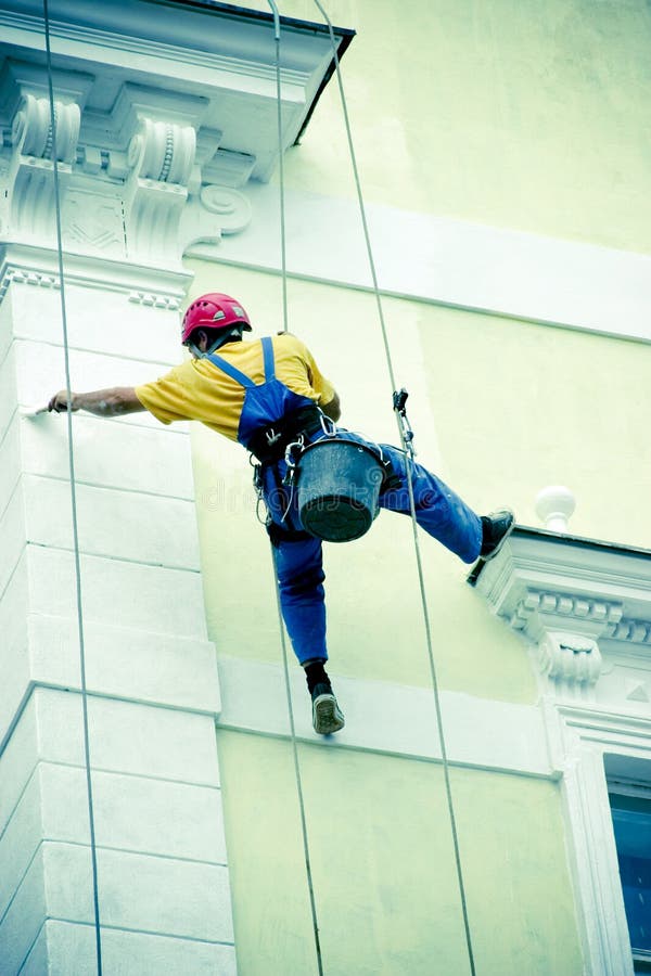 Facade Painter on Abseil Ropes Stock Image - Image of risky, reaching ...