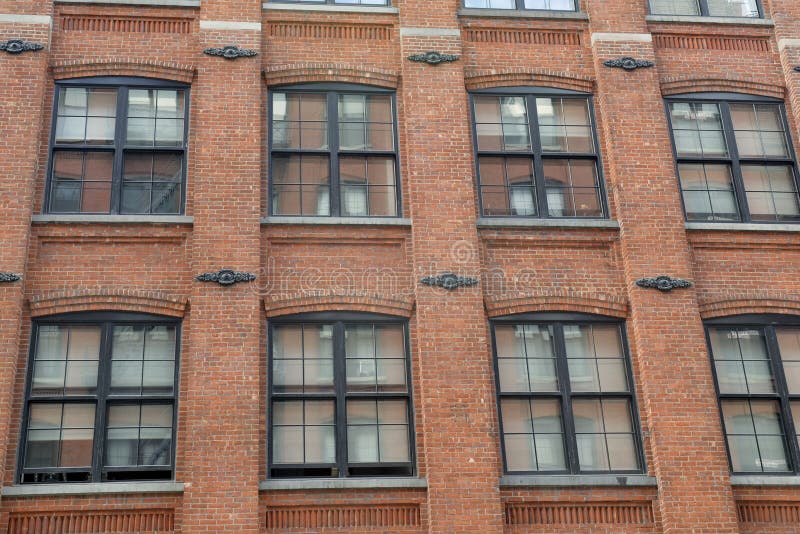 Facade of Red Brick Building Stock Photo - Image of brick, mason: 49718622