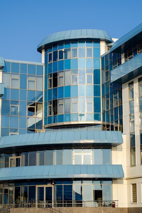 The Facade of the Round Building is Made of Blue Glass. Side View Stock ...