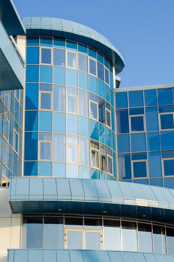 The Facade of the Round Building is Made of Blue Glass. Side View Stock ...