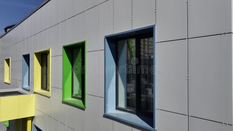 Facade of School Building with Windows Enclosed in Colored Jambs Stock ...