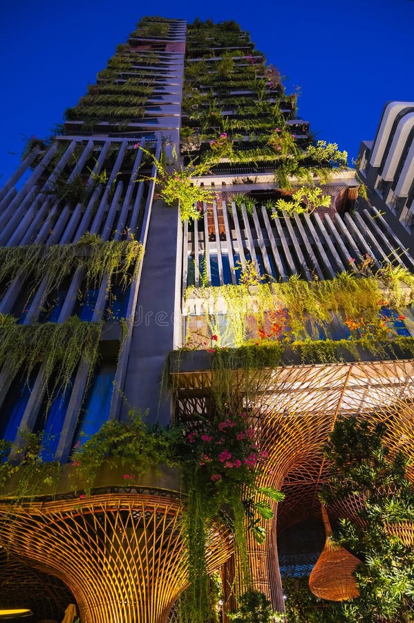 The Facade of Skyscraper Hotel with Landscaping and Hanging Gardens in ...