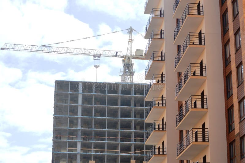 Skyscraper construction stock photo. Image of house - 272447264