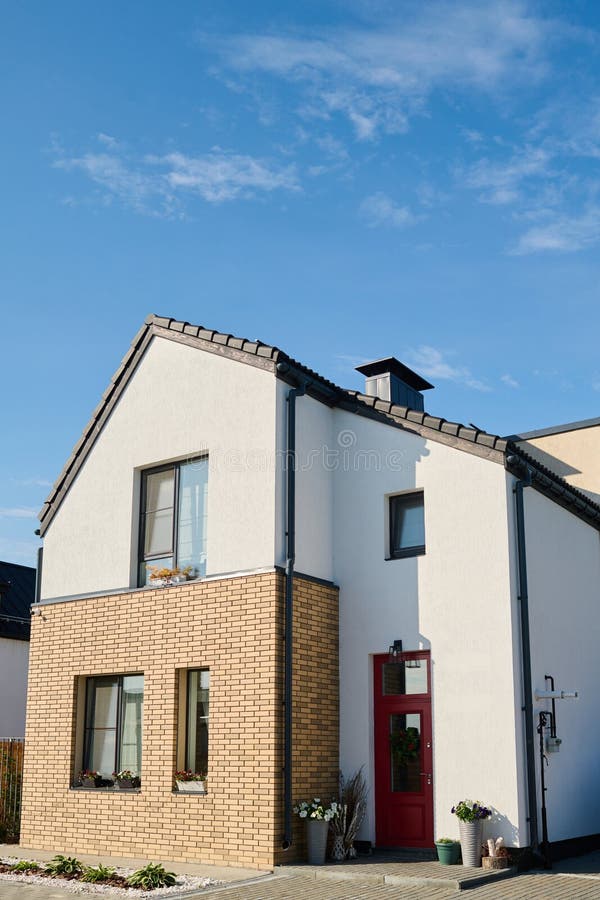 Facade of Small White Cottage with Three Windows and Closed Door Stock ...