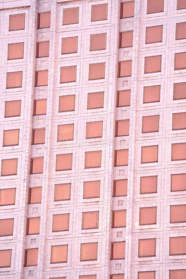 The Facade of a Tall Building with the Reflection of the Sky in the ...