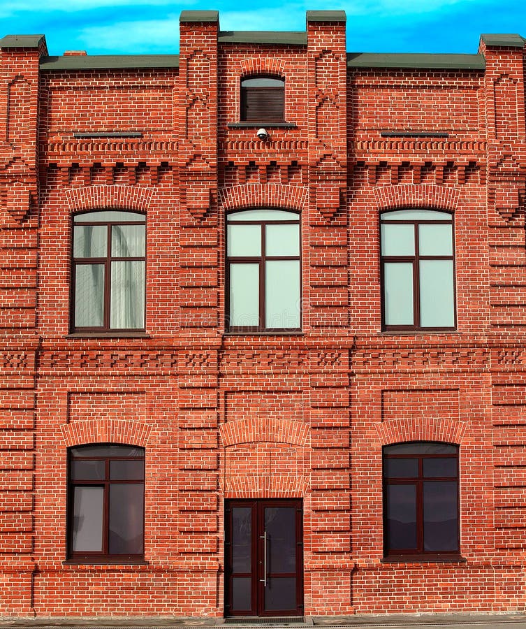 Facade of the Three-storey Red Brick Building Stock Image - Image of ...