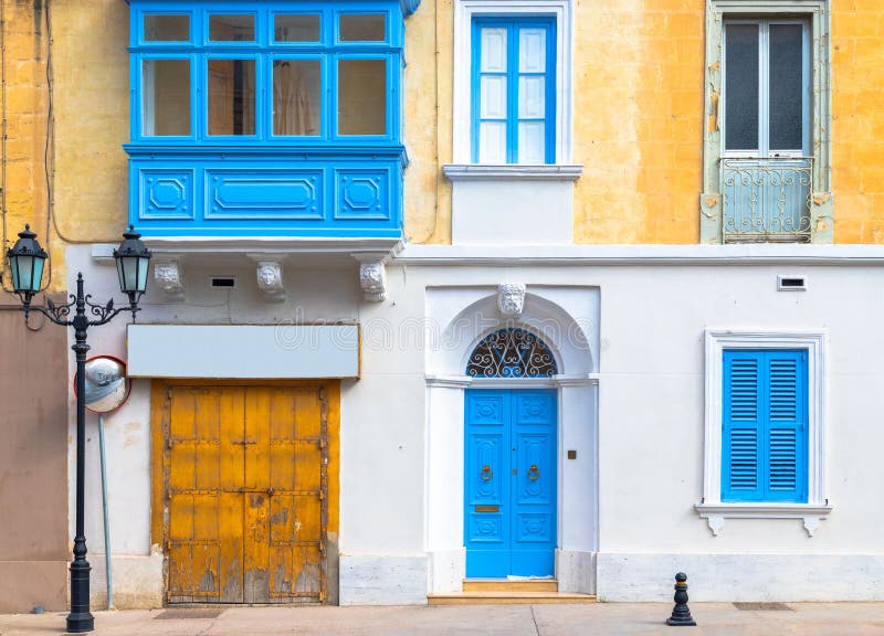 Facade of a Traditional Maltese Building with Balcony, Shuttered ...