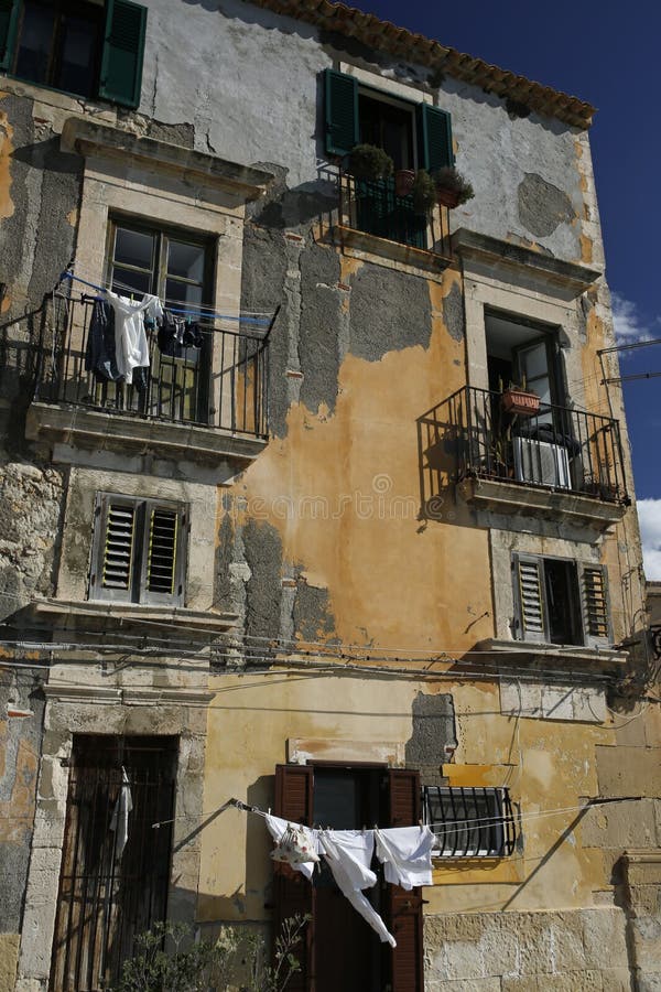 Italian Rustic Building with Laundry and Flowerpots Stock Photo - Image ...