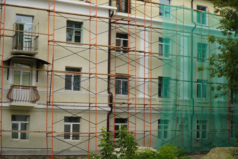Facade Under Construction with Scaffolding and Protective Net Stock ...