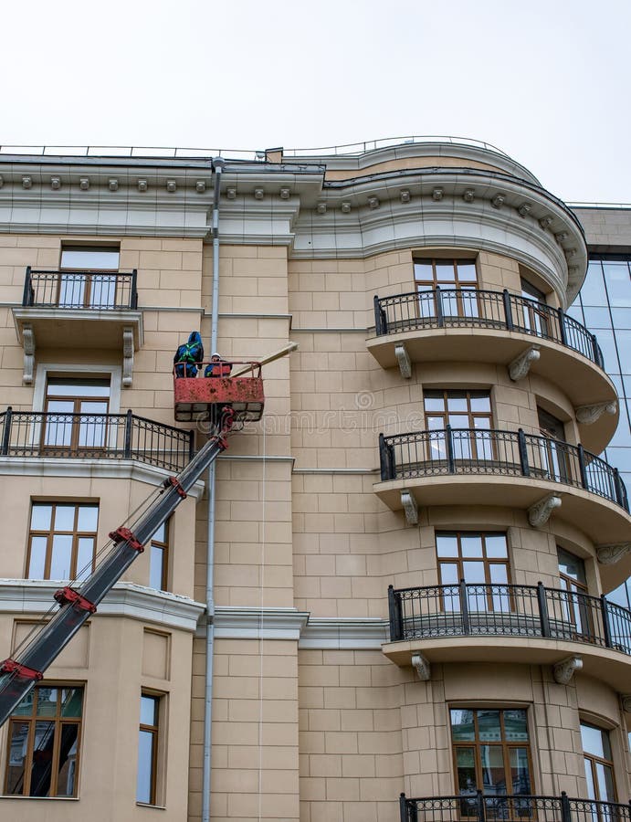 Facade works stock photo. Image of work, climb, uniform - 295141022