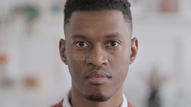 Face of African Man Looking at the Camera Stock Image - Image of ...