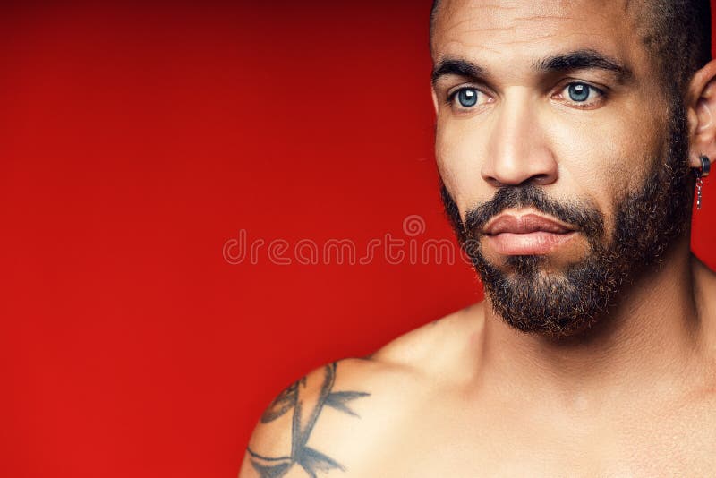 Face with a Beard and an Earring in the Ear of a Cuban Man Close-up ...