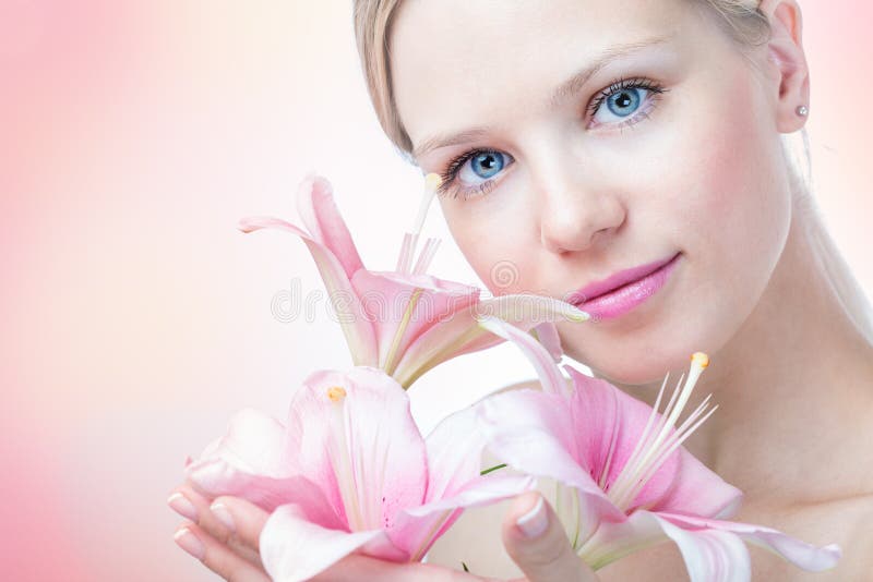 Face of a Beautiful Woman with Lily Stock Photo - Image of cosmetics ...