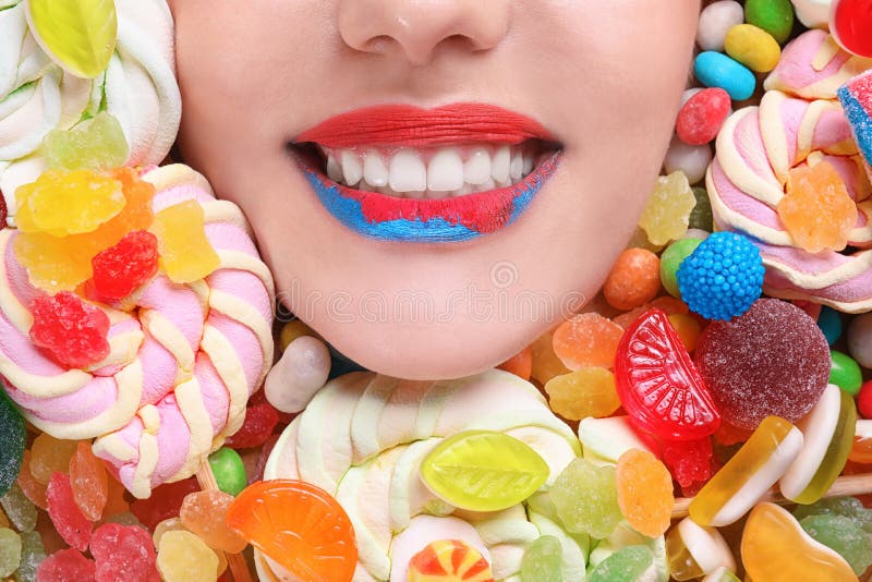 Face of Beautiful Young Woman with Creative Makeup Surrounded by ...