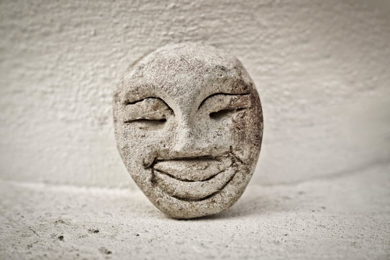 A face carved out of stone stock image. Image of ancient - 237791135