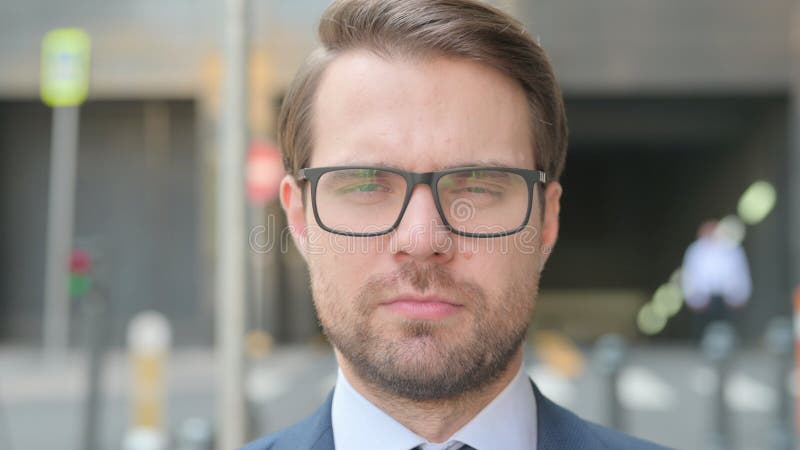 Face Close Up of Young Businessman Looking at Camera Stock Image ...