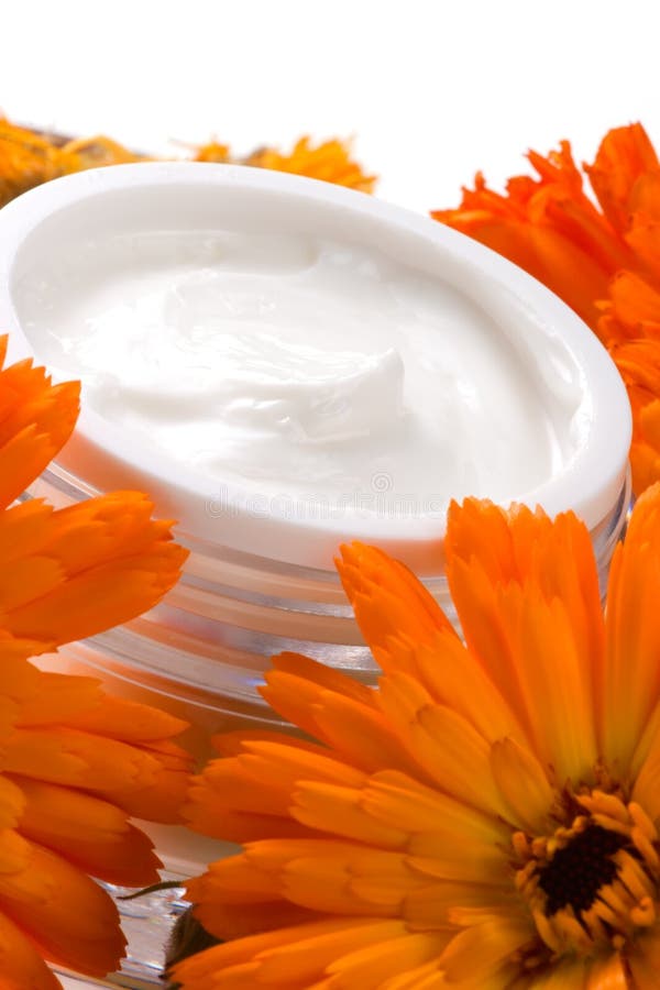 Face Cream and Calendula Flowers Stock Photo - Image of container ...