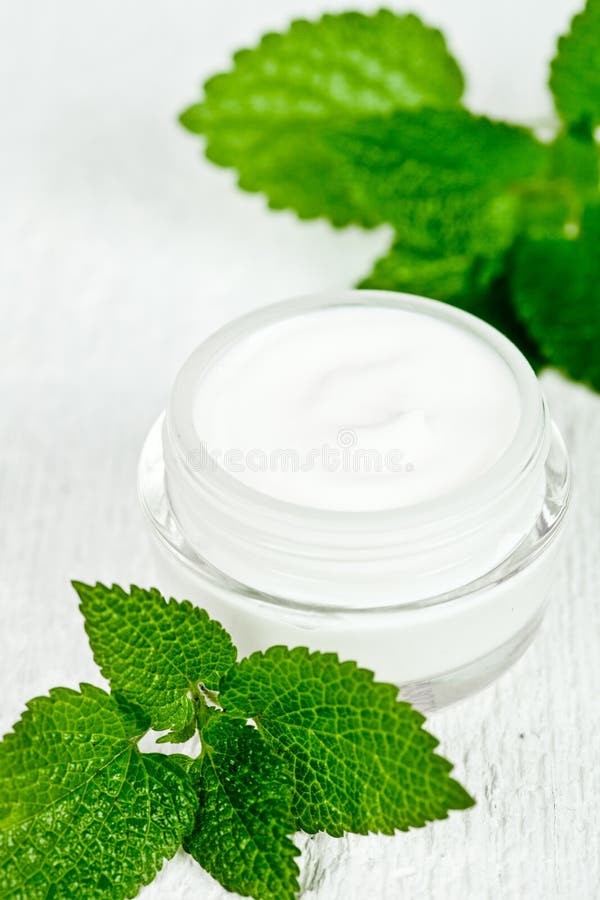 Face Cream in Glass Jar with Green Leaves of Urtica Stock Image - Image ...