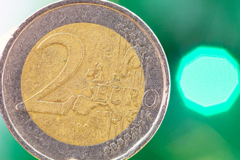 Face of 2 Euro Coin with Blurred Green Bouquet in the Background. Stock ...
