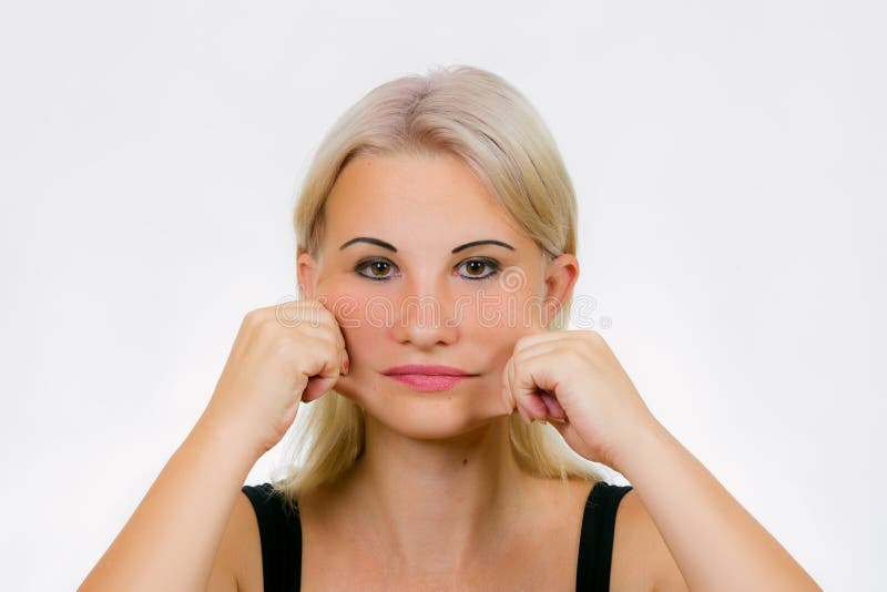 Pull the cheeks stock photo. Image of eyes, asian, close - 36030974