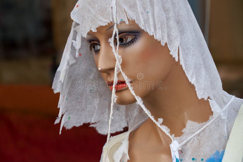 Face of a Female Display Dummy with Torn Painters Suit Cap on Head ...